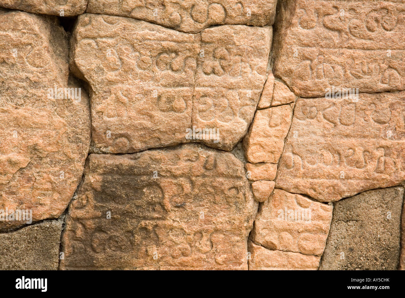 scripture in a wall of ancient temple in Polonnaruwa Stock Photo - Alamy