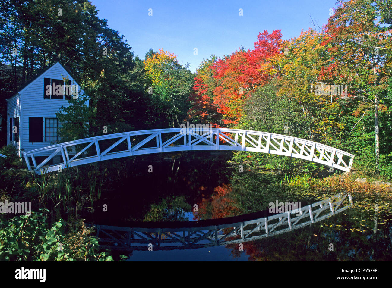 Colorful New England Scene of a Curved Bridge And Water in Somersville ...