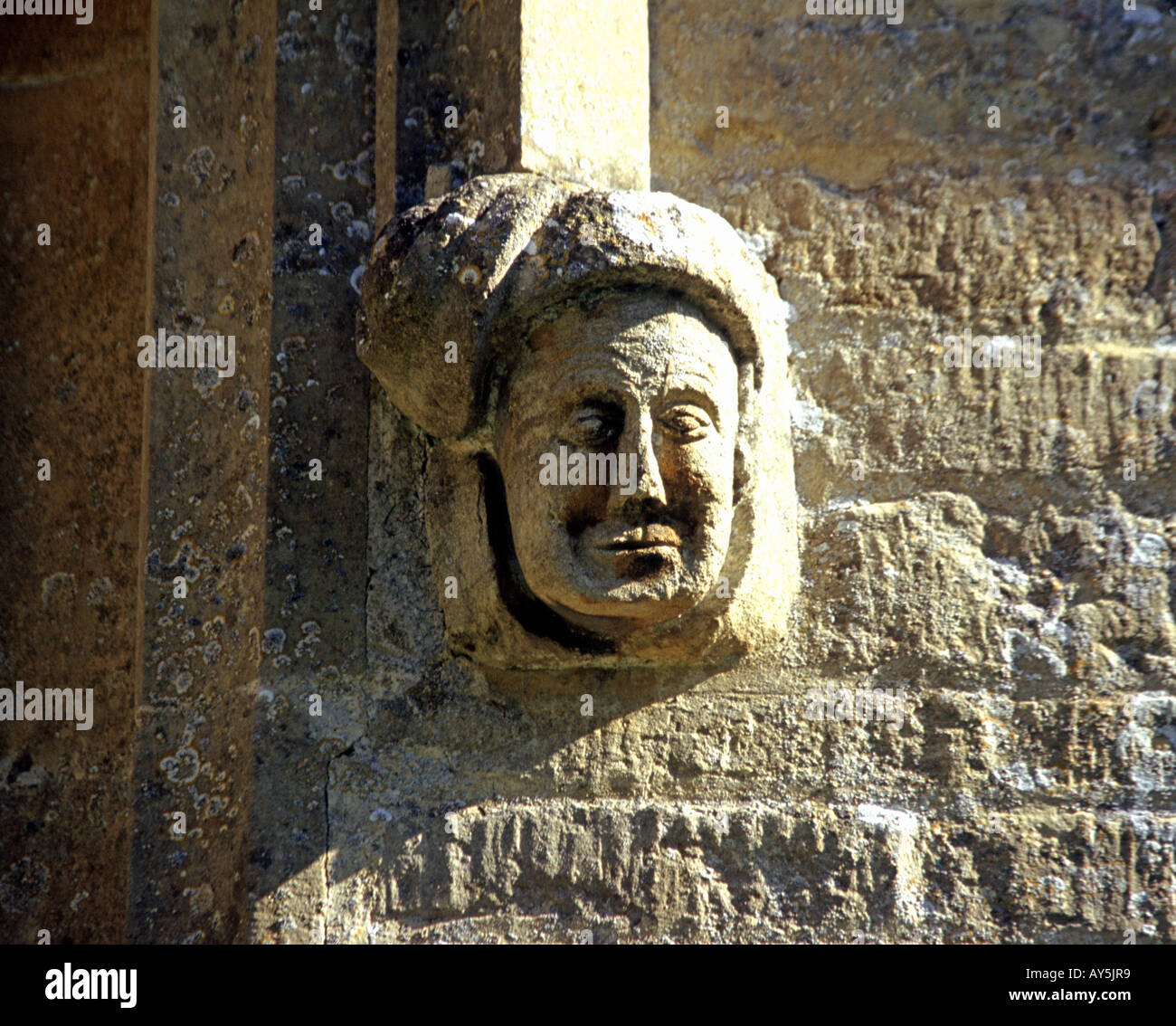Carved stone face on the side of Cornwell church Gloucestershire The ...