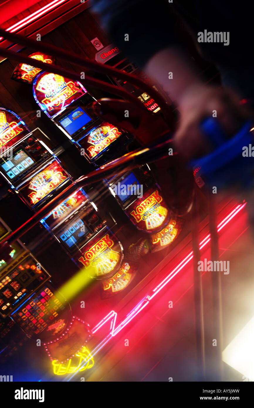 Slot machine (fruit machine) in amusement arcade Stock Photo - Alamy