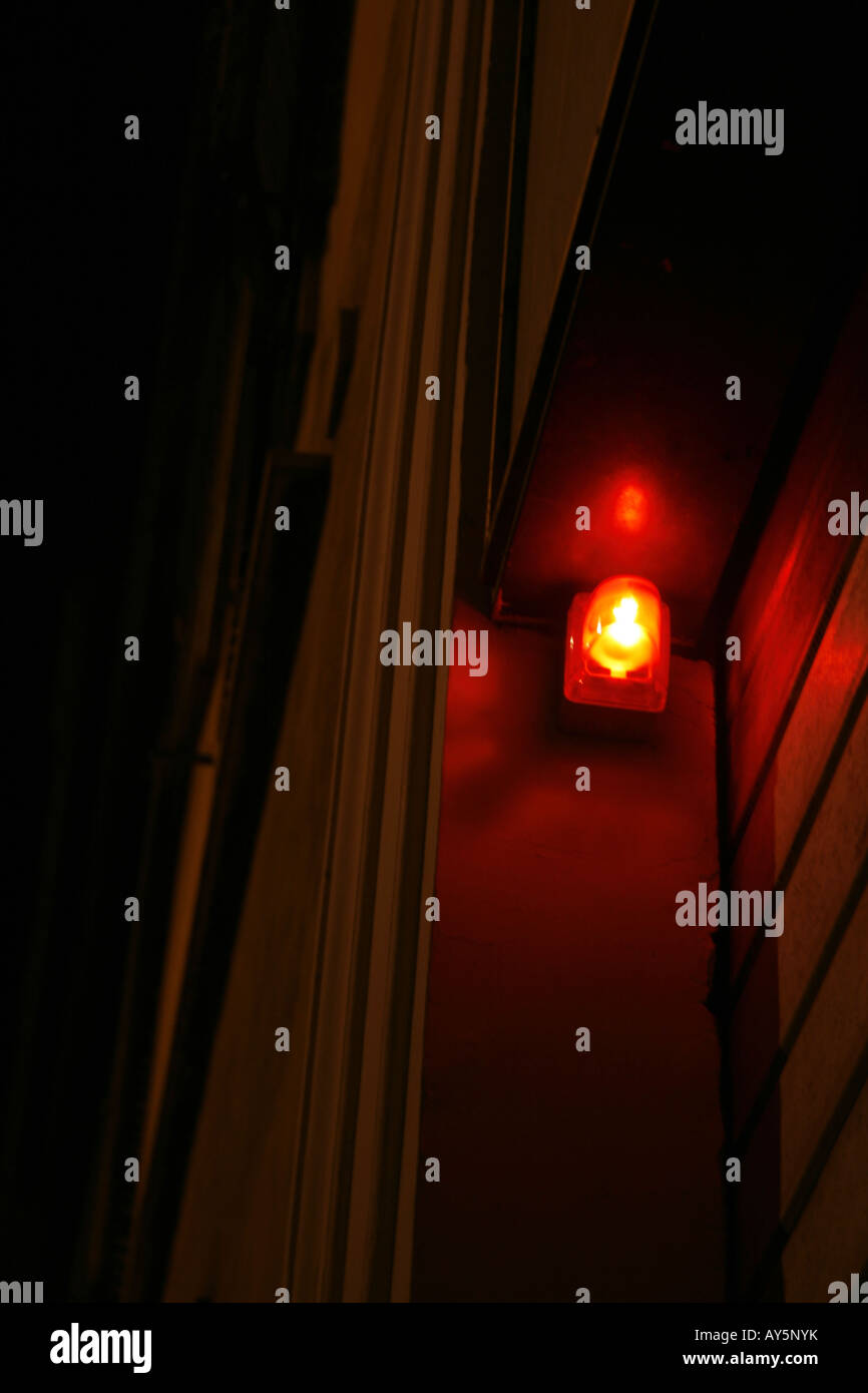 red security light alarm on wall Stock Photo - Alamy