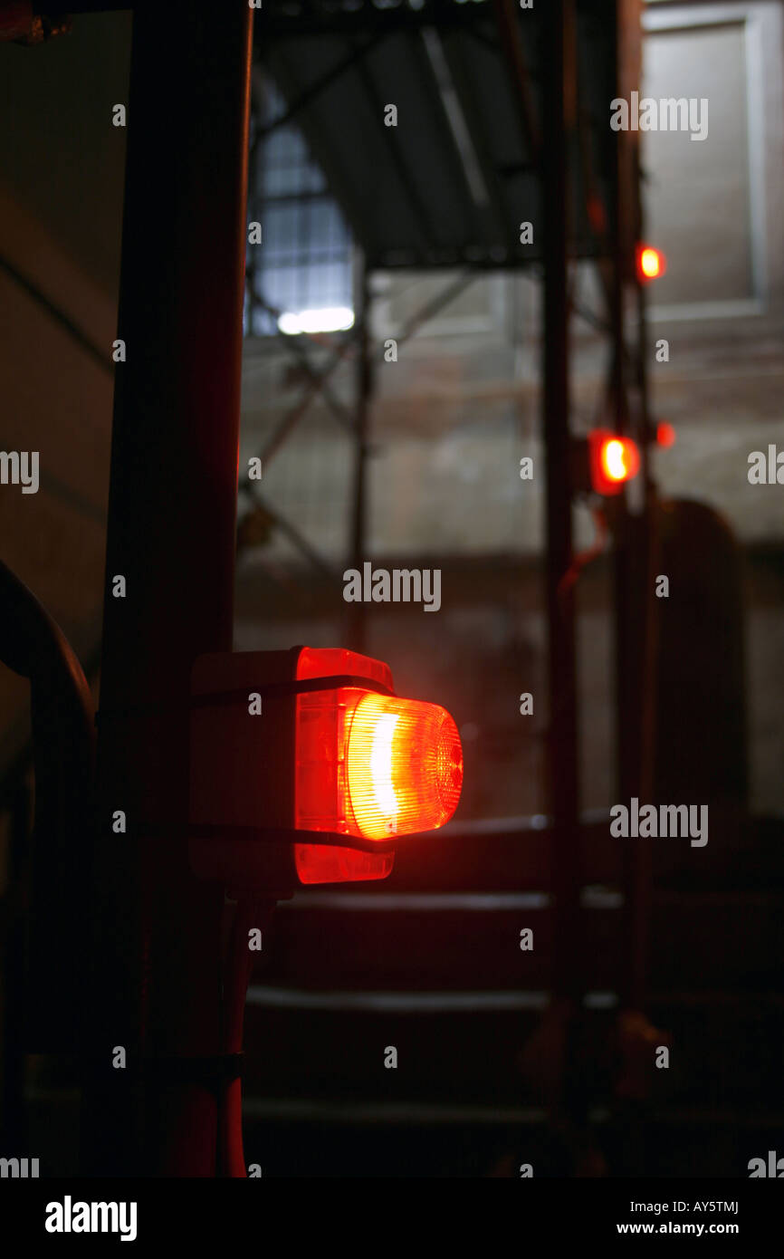 security light on scaffolding at night Stock Photo - Alamy