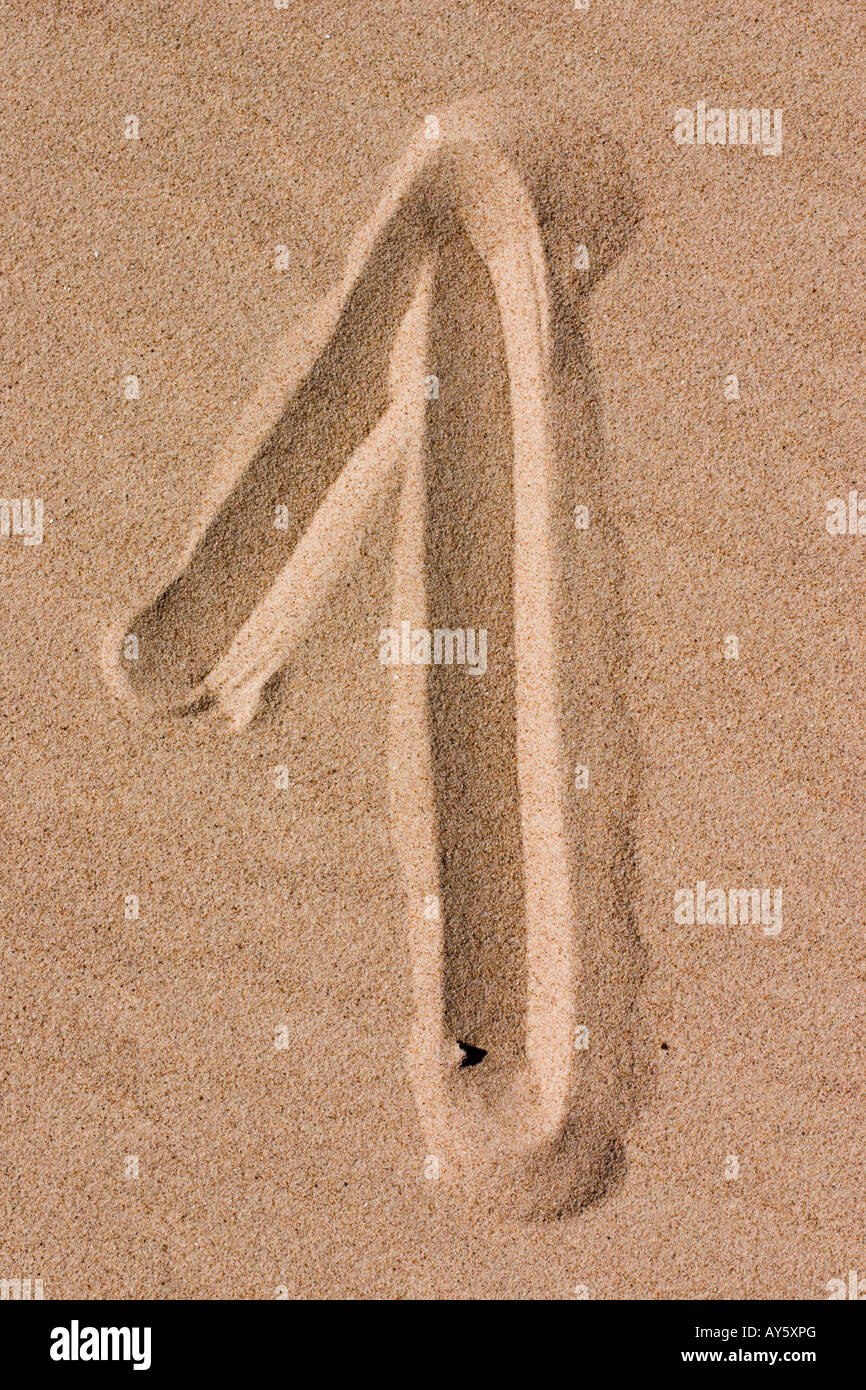 Numbers written on sand Stock Photo - Alamy