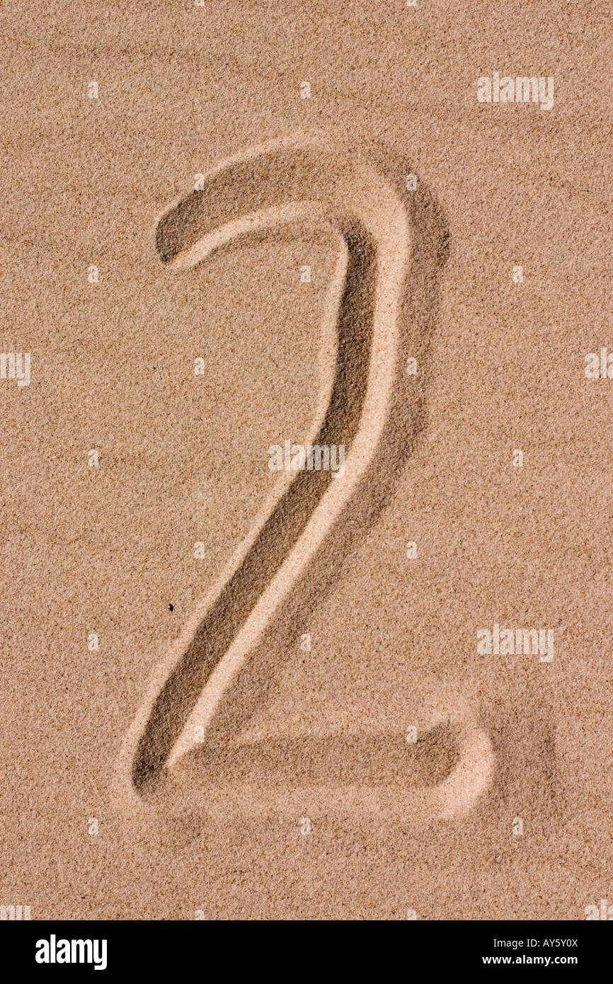 Numbers written on sand Stock Photo - Alamy