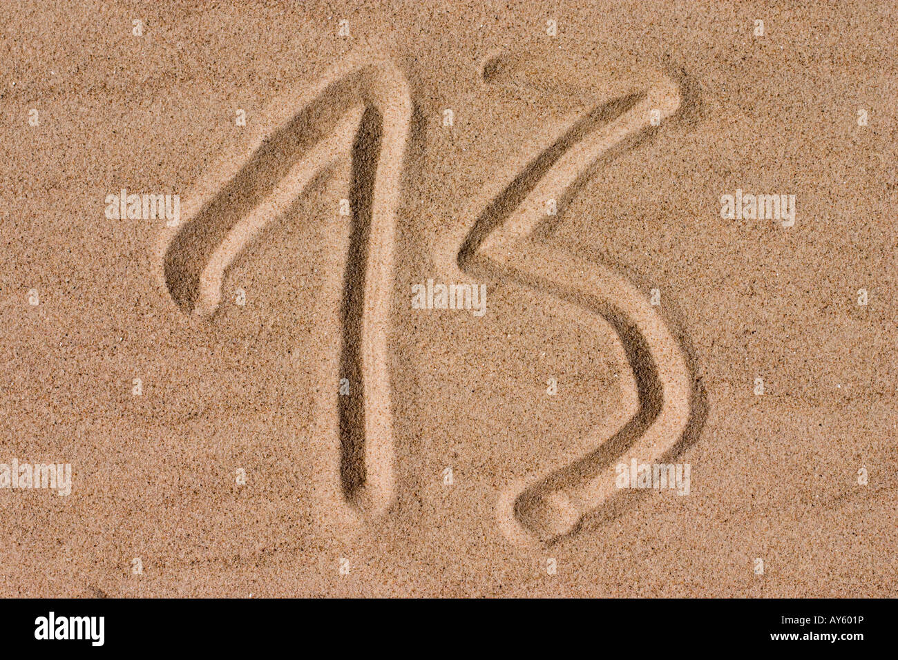 Numbers written on sand Stock Photo - Alamy