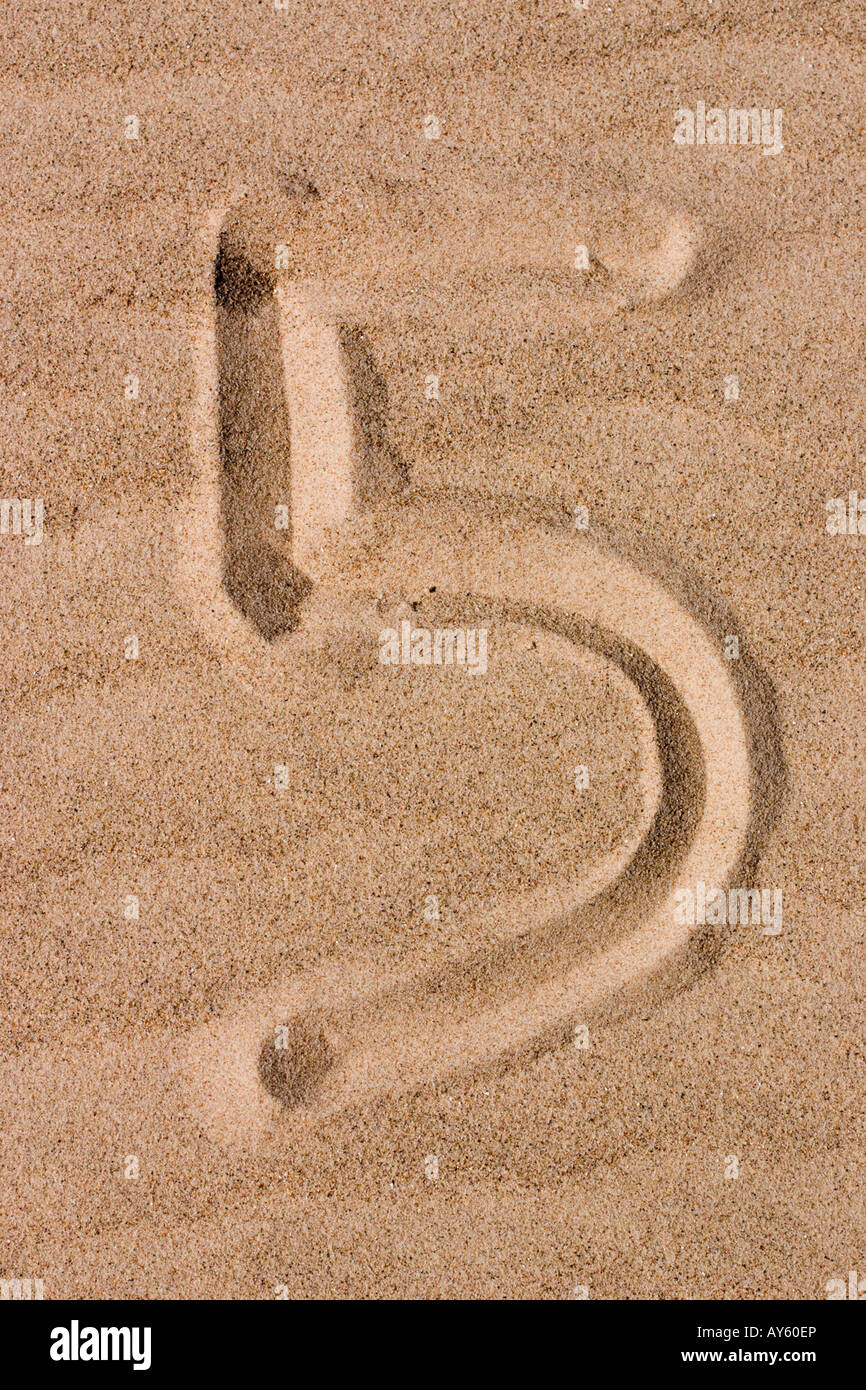 Numbers written on sand Stock Photo - Alamy