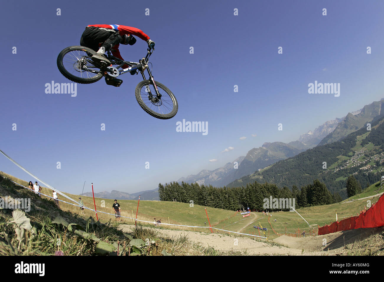 A Downhill mountainbike racer in action Stock Photo - Alamy