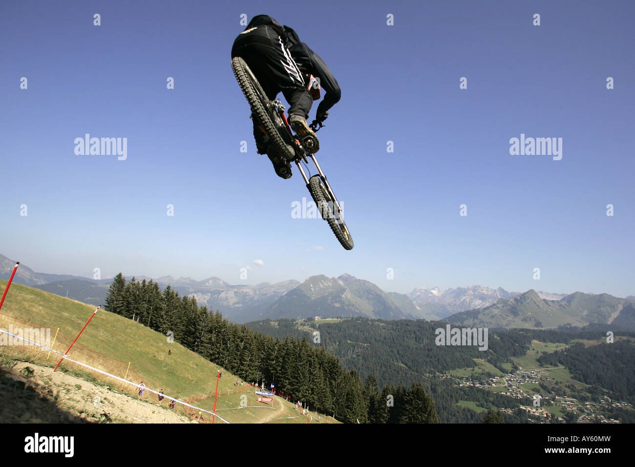 A Downhill mountainbike racer in action Stock Photo - Alamy