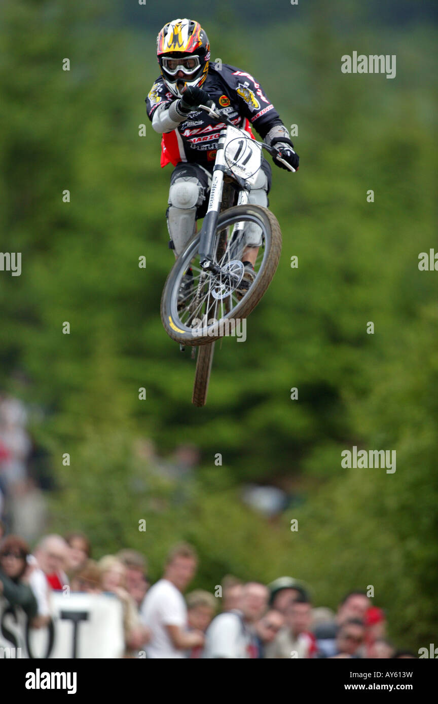 A Downhill mountainbike racer in action Stock Photo - Alamy