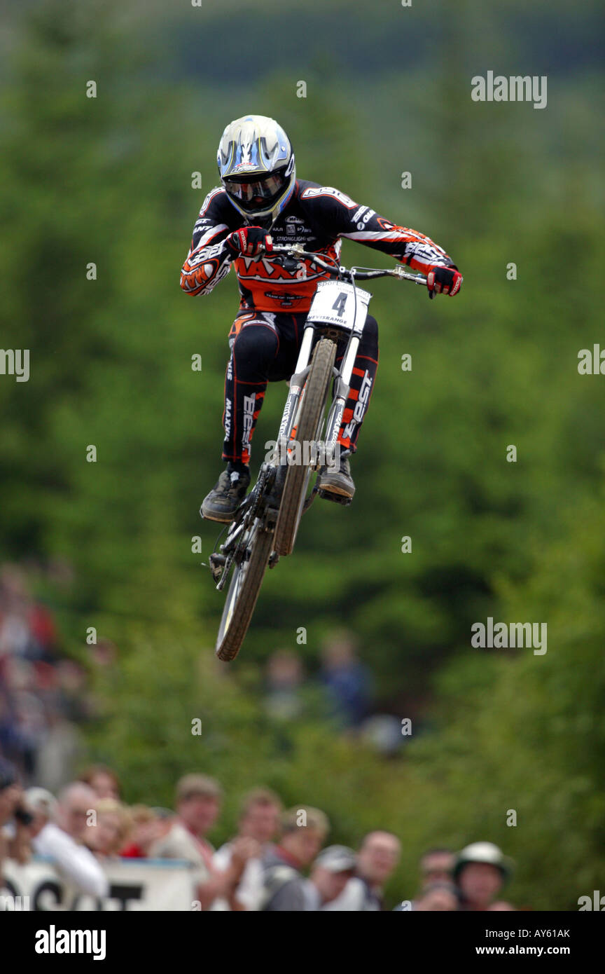 A Downhill mountainbike racer in action Stock Photo - Alamy