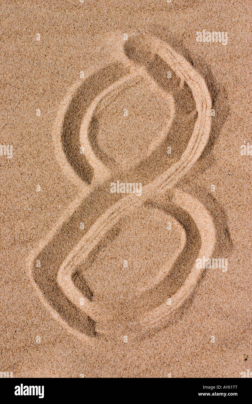 Numbers written on sand Stock Photo - Alamy