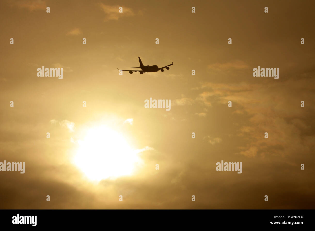 Boeing 747 taking off at sunset Stock Photo - Alamy