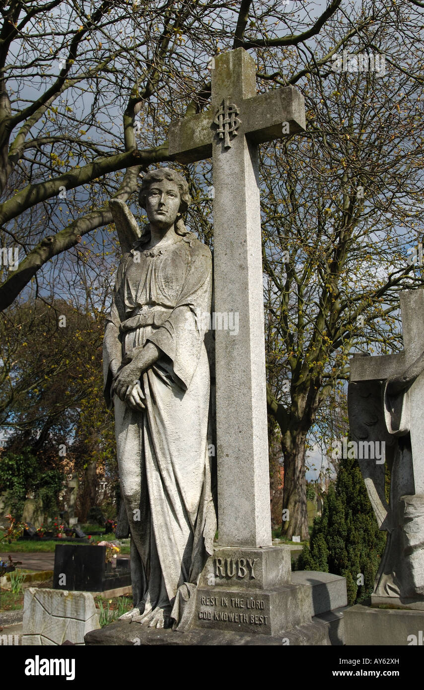 Stone angel on grave in Kensal Green Cemetery, London Stock Photo - Alamy