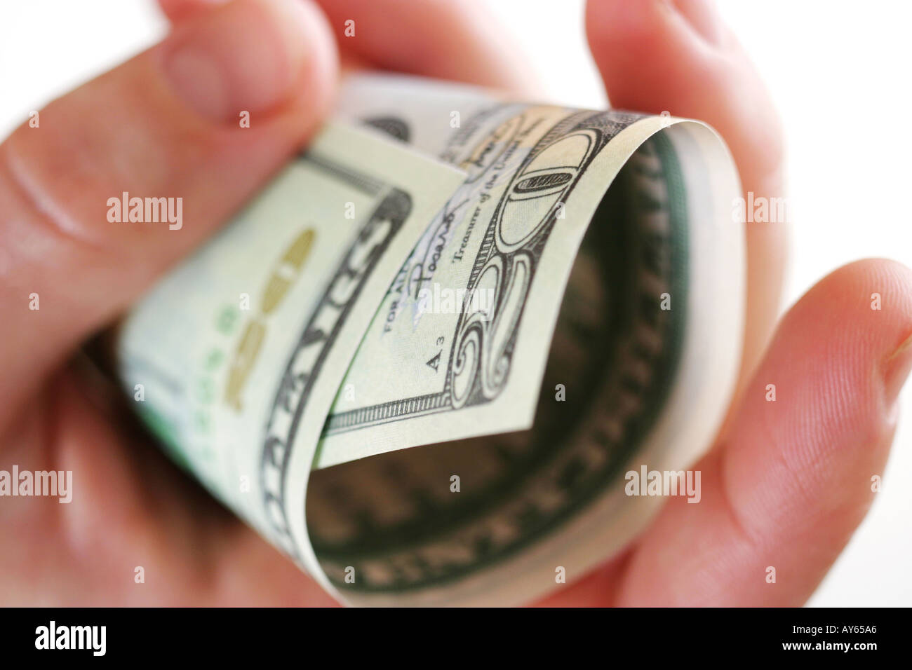 hand holding a new twenty dollar bill Stock Photo - Alamy