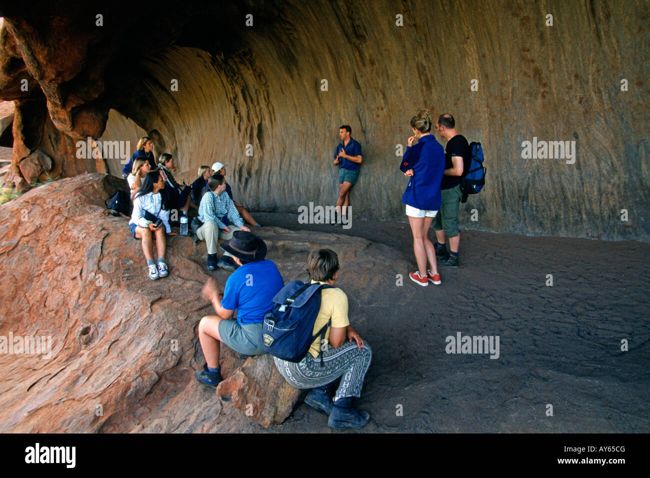10 97 Australia Uluru Ayers Rock Tourists Photo c Simon Grosset Stock ...