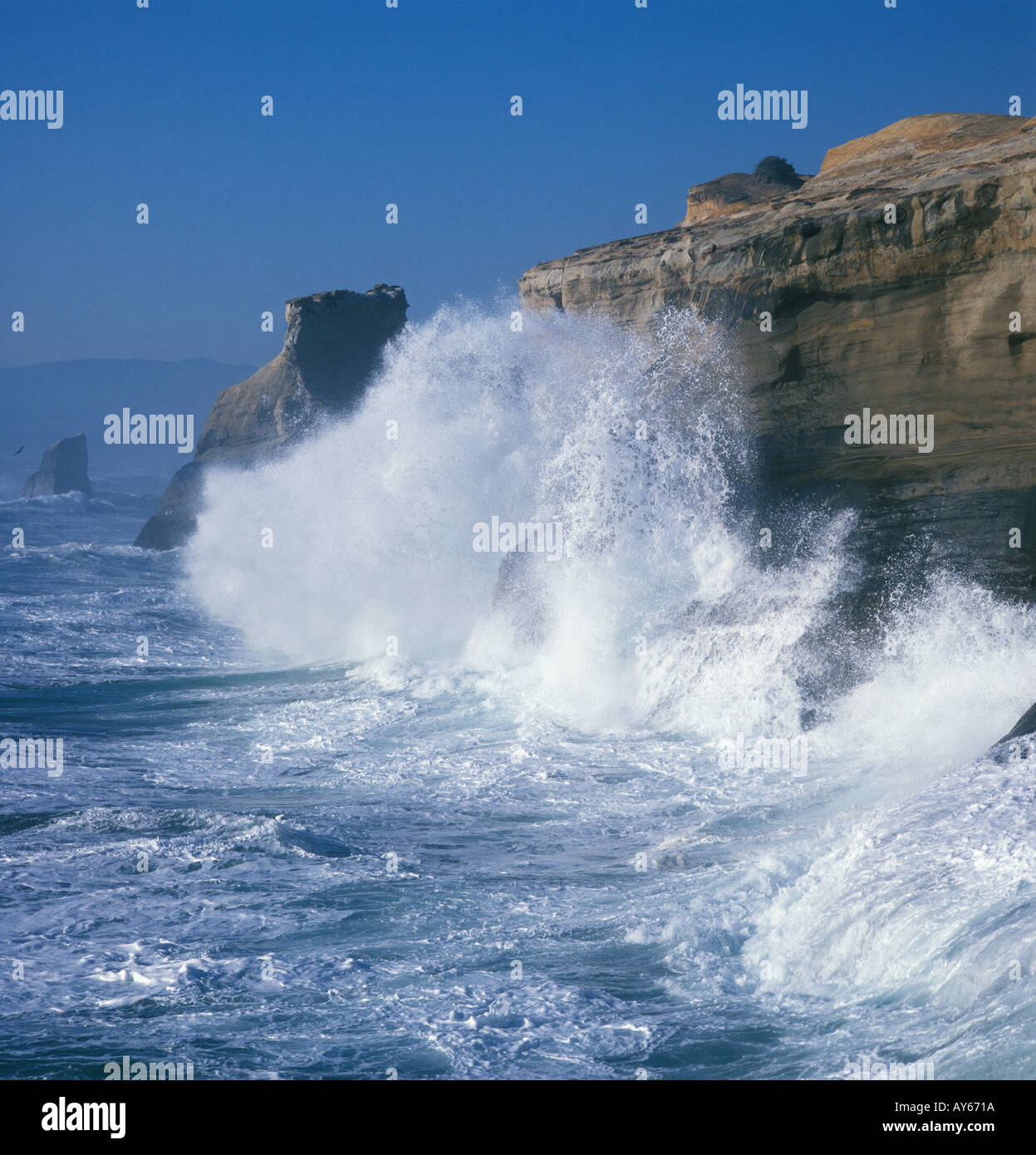 huge waves crash on rocks at Cape Kiwanda Oregon USA Stock Photo - Alamy