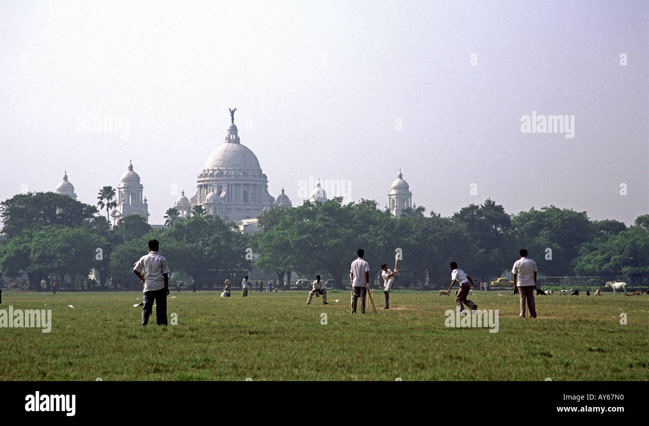 A game of cricket on the Maidan with the Victoria Memorial Hall in the ...