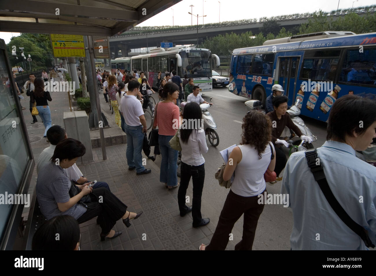People are waiting for buses at morning busy time(heavy traffic) in bus ...