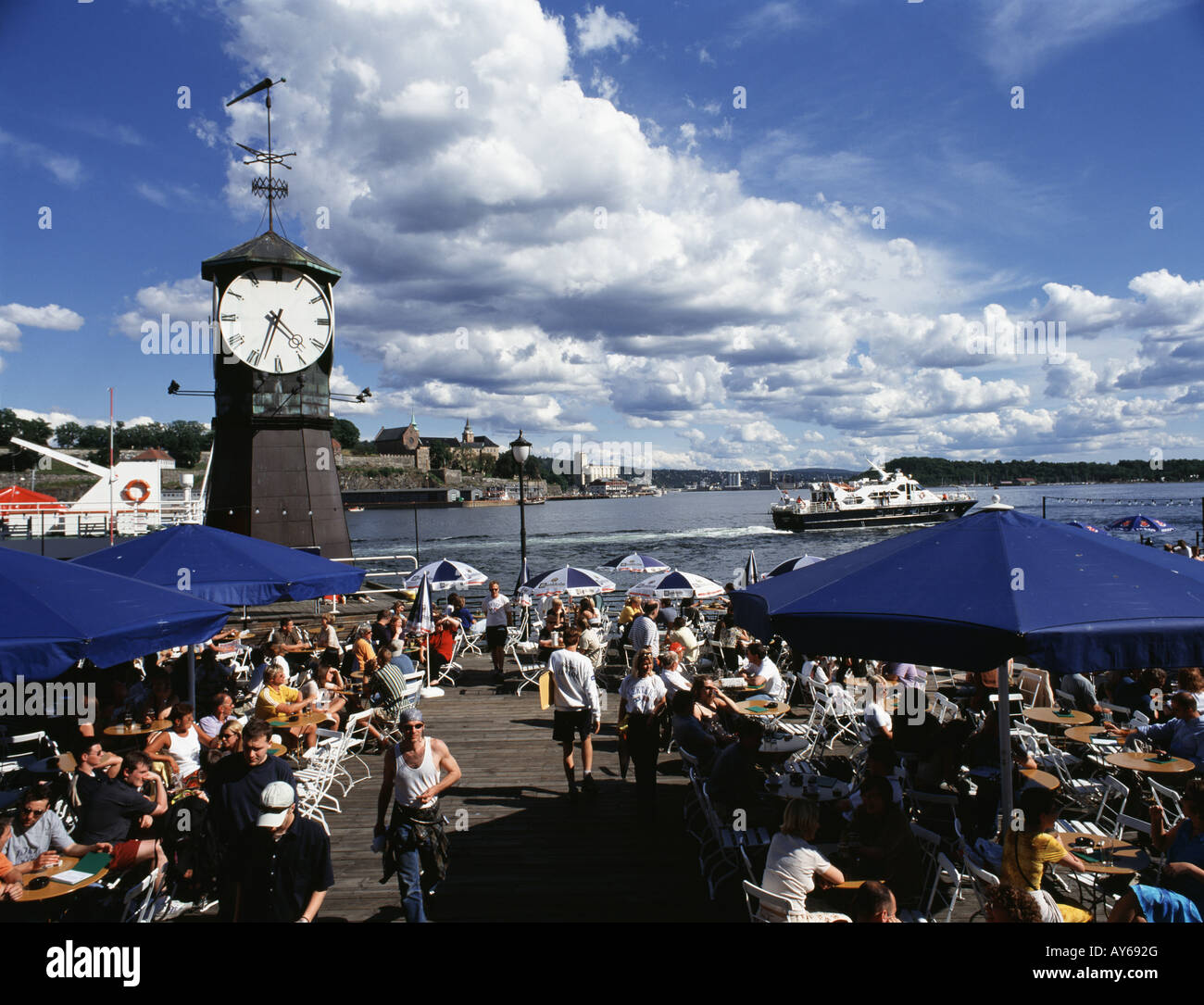 Pipervika harbour Cafe Tourists Boats Stock Photo - Alamy