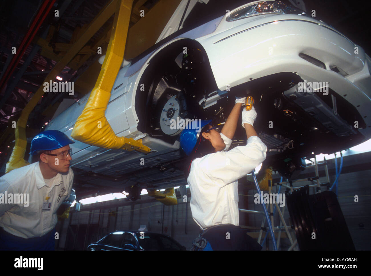 Shanghai GM Buick assembly line with Chinese woman worker and American ...