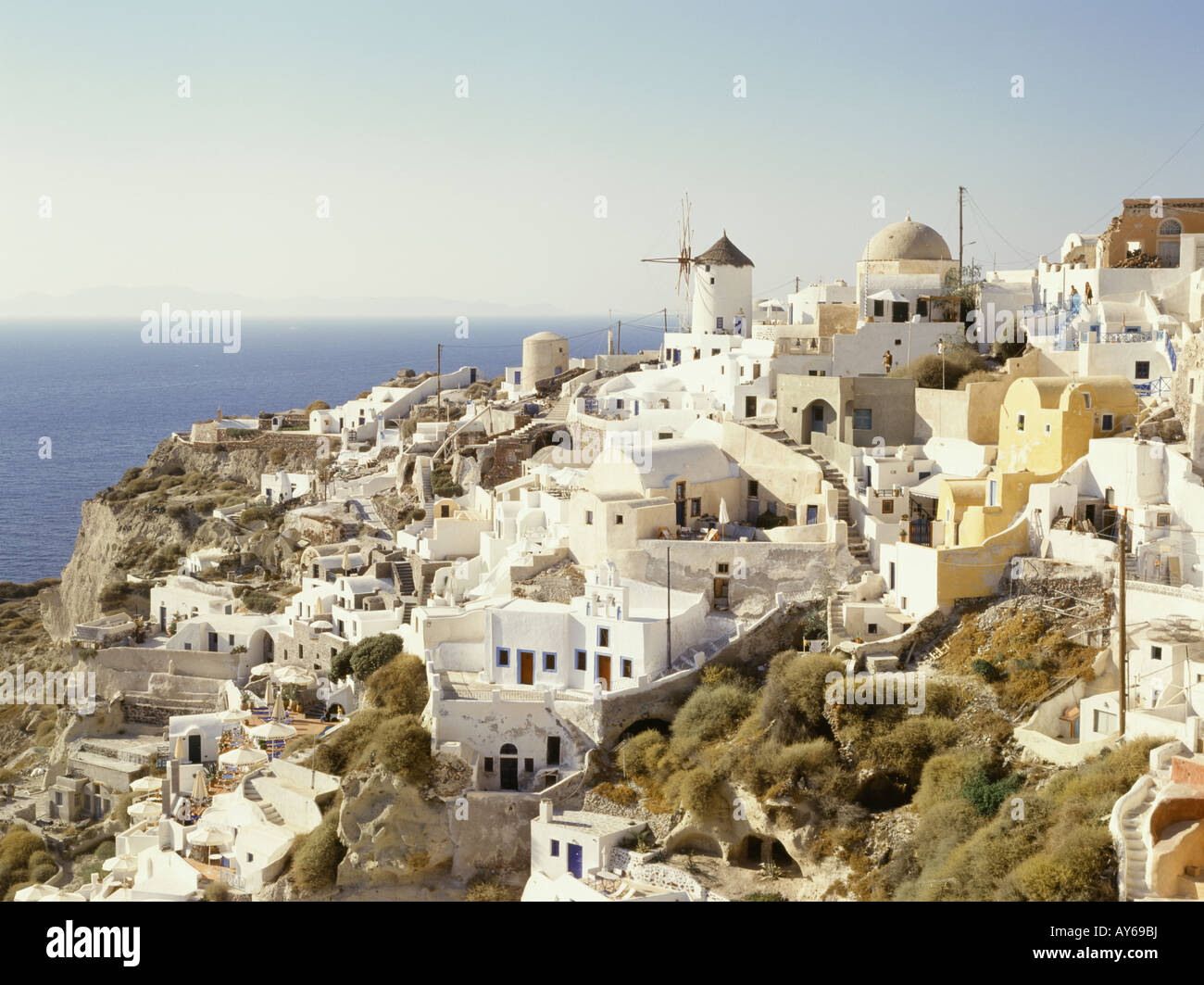 Cyclades Islands. View of white buildings of town perched on hill ...