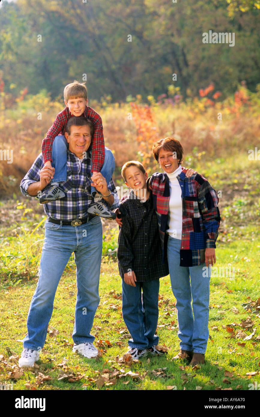 Children with Parents in Beautiful Fall Color Setting Stock Photo - Alamy
