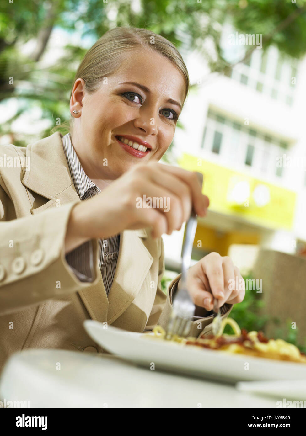 A businesswoman having her lunch break Stock Photo - Alamy