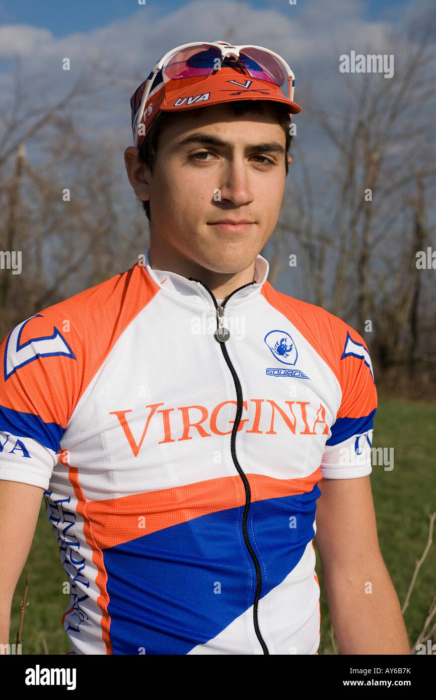 Portrait of a young male college age cyclist wearing his team's kit ...