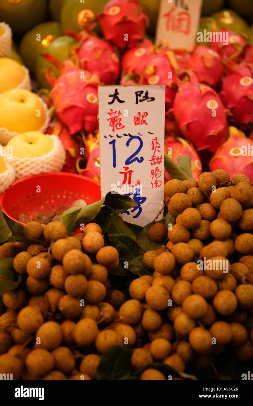 Fruit stall including dragon fruit and lychees, Street market, Hong ...