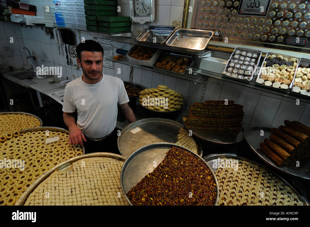 An Arab pastry shop in the souk of the old town of Aleppo, Syria Stock ...