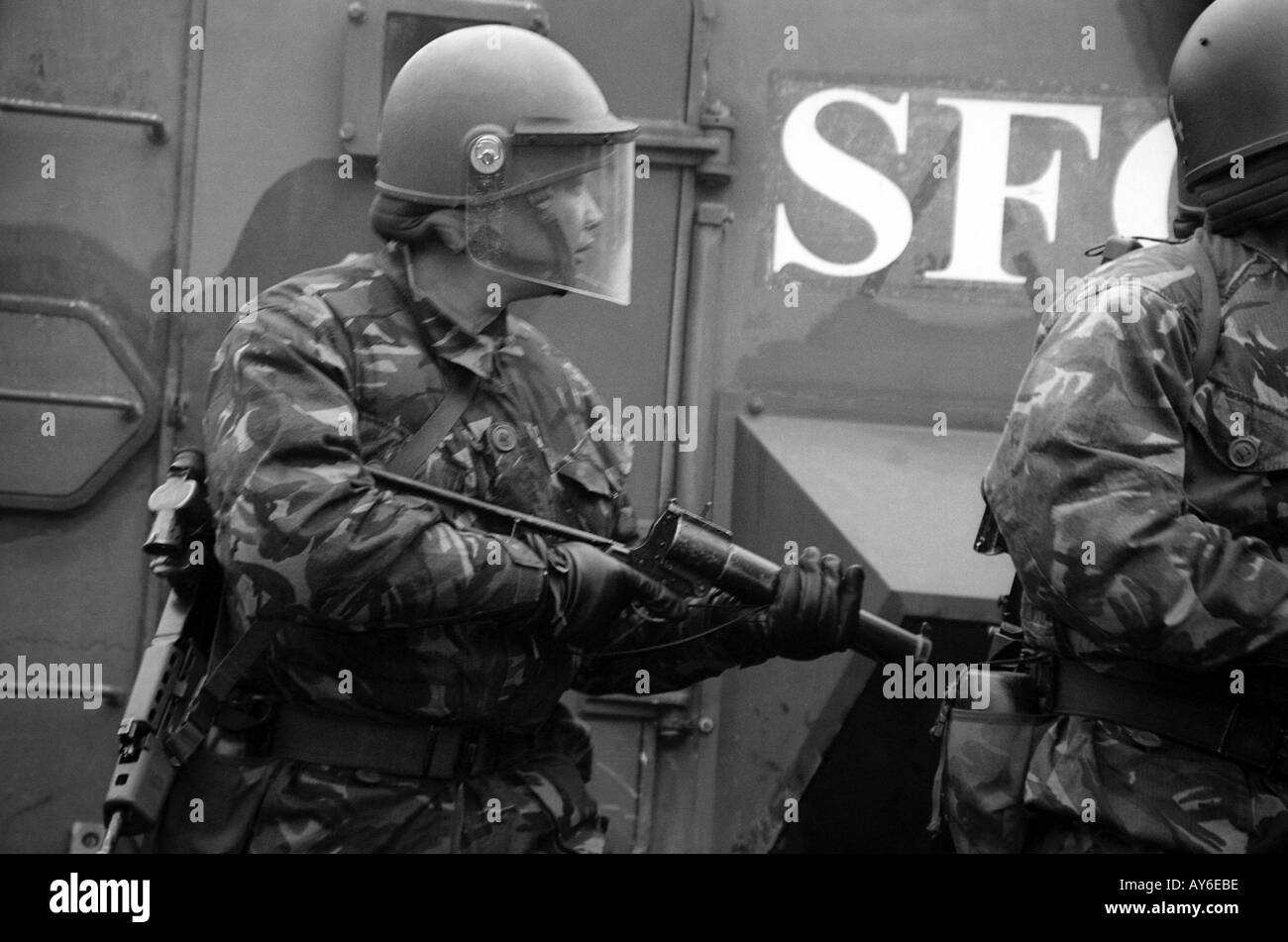 British Soldier from the Royal Gurkha Rifles Waits Behind Riot Shields ...