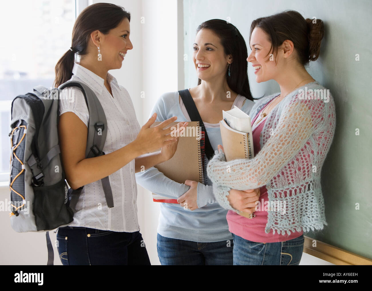 Female college students in classroom Stock Photo - Alamy