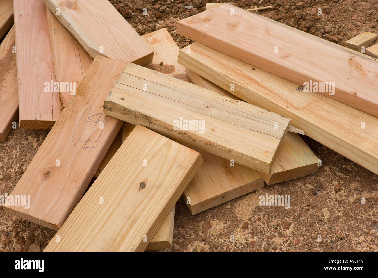 Lumber scraps from constructing a house Stock Photo - Alamy