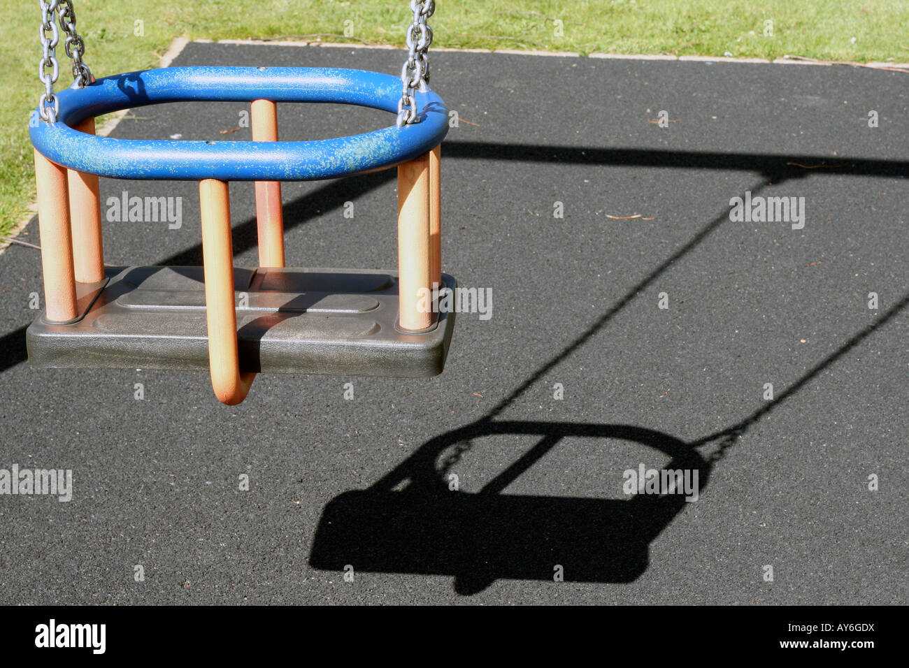 Swing and shadow Stock Photo - Alamy