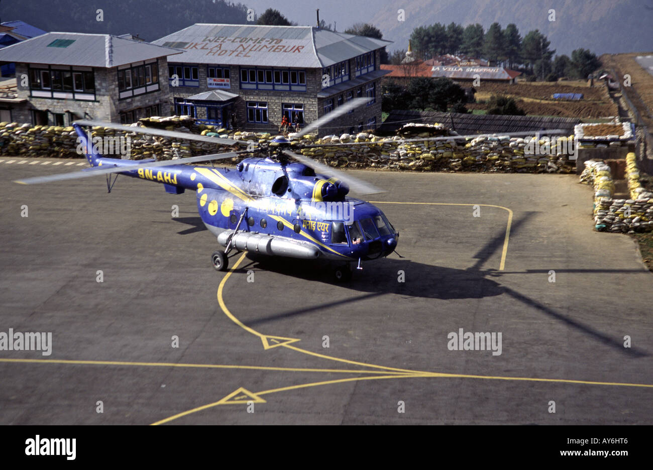 Russian helicopter at Lukla mountain airstrip in the Himalayas Nepal ...