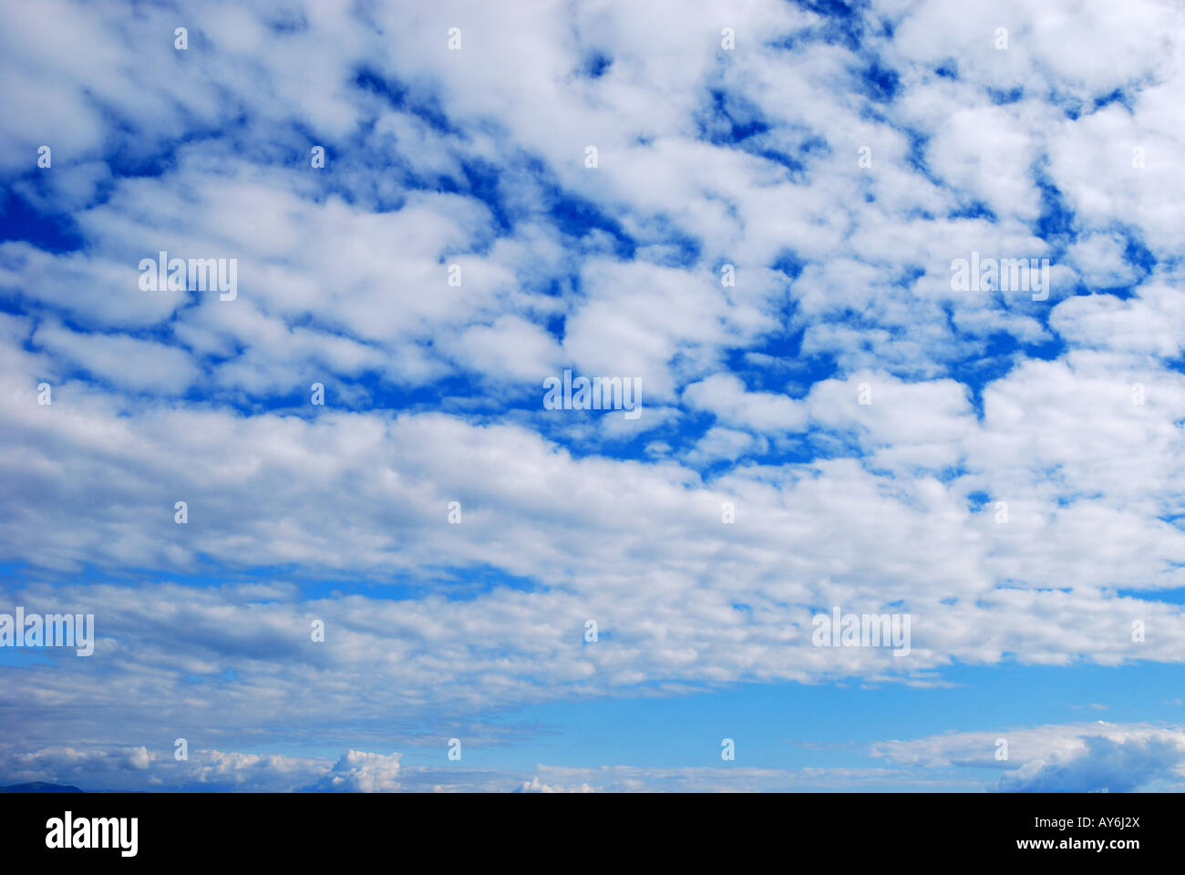 A cloudy blue sky over the Ionian sea during Spring Stock Photo - Alamy