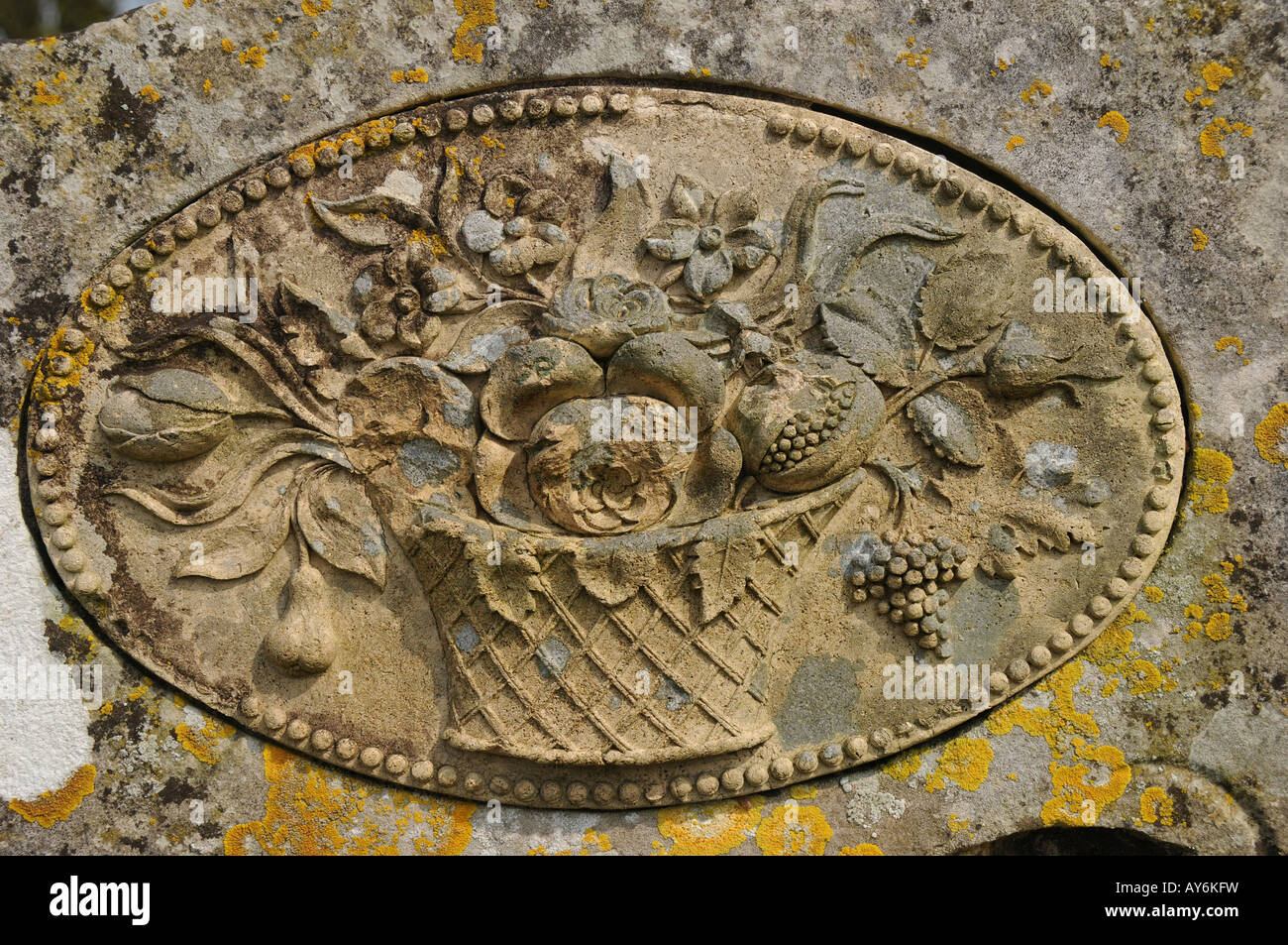 A Harmer terracotta bas-relief on a gravestone in an East Sussex ...