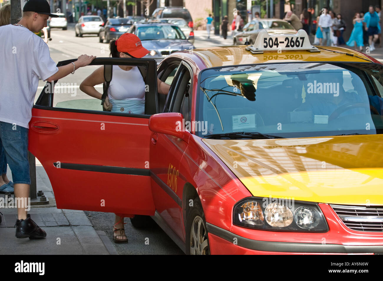 People getting into a taxi cab Toronto Canada Stock Photo - Alamy
