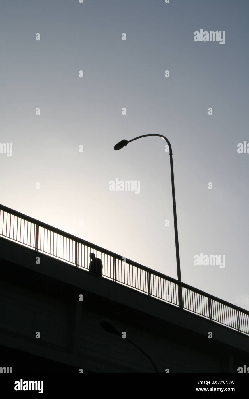 man walking on flyover bridge at night Stock Photo - Alamy
