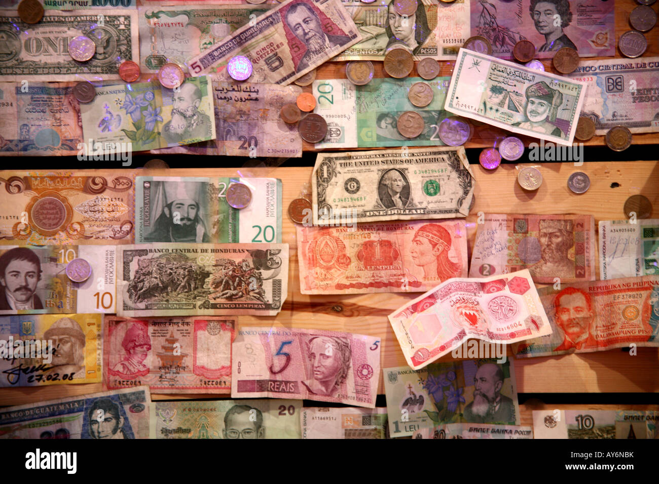Display of banknotes and coins of many countries Stock Photo - Alamy