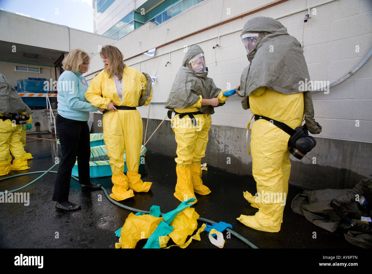 Volunteers shed chemical biological protective clothing after ...