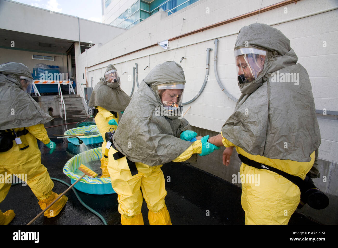 Volunteers shed chemical biological protective clothing after ...