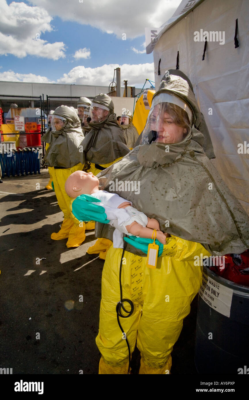 Wearing disposable emergency protective clothing clothing a volunteer ...