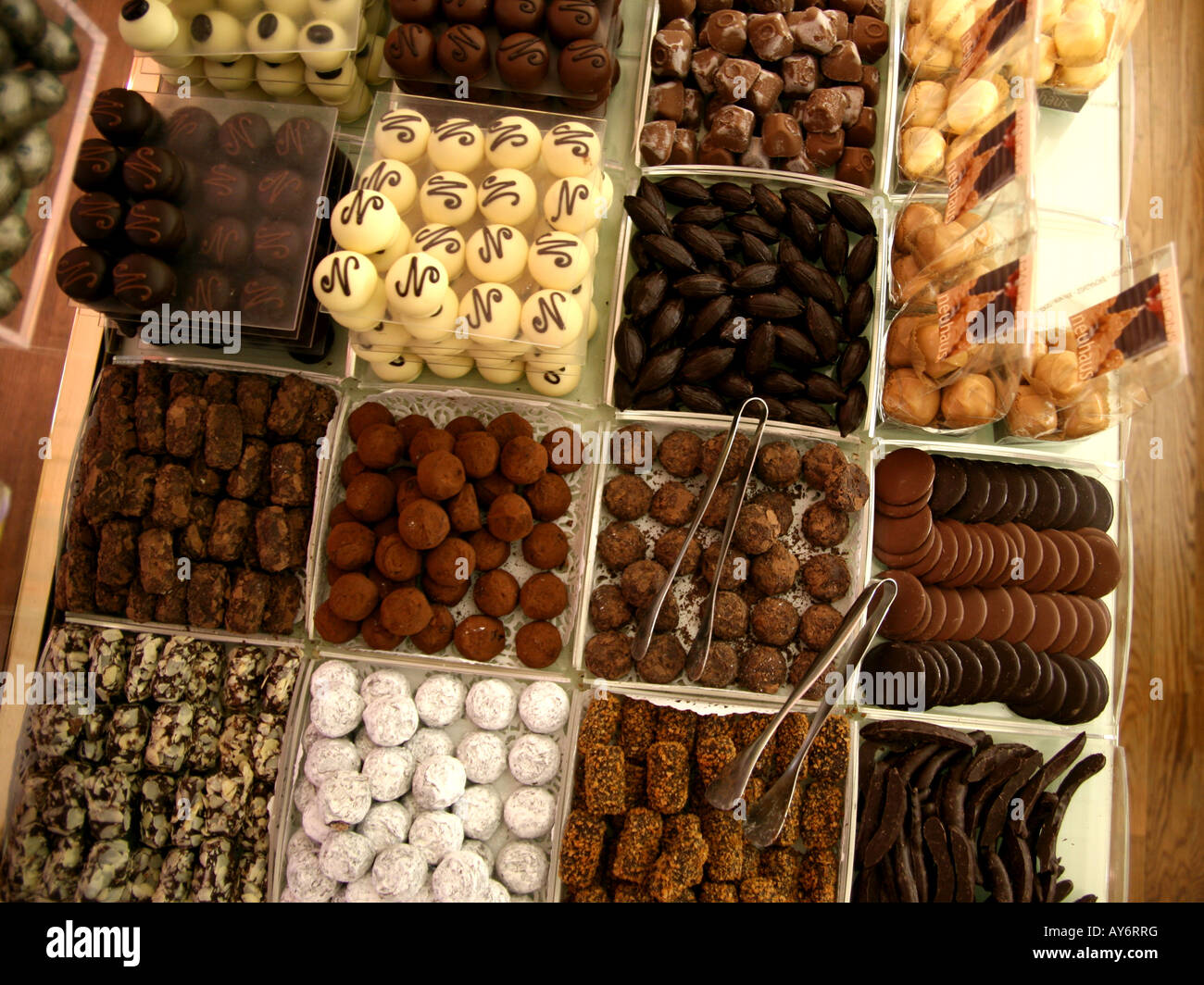 Luxury chocolates & biscuits in Brussels shop Stock Photo - Alamy