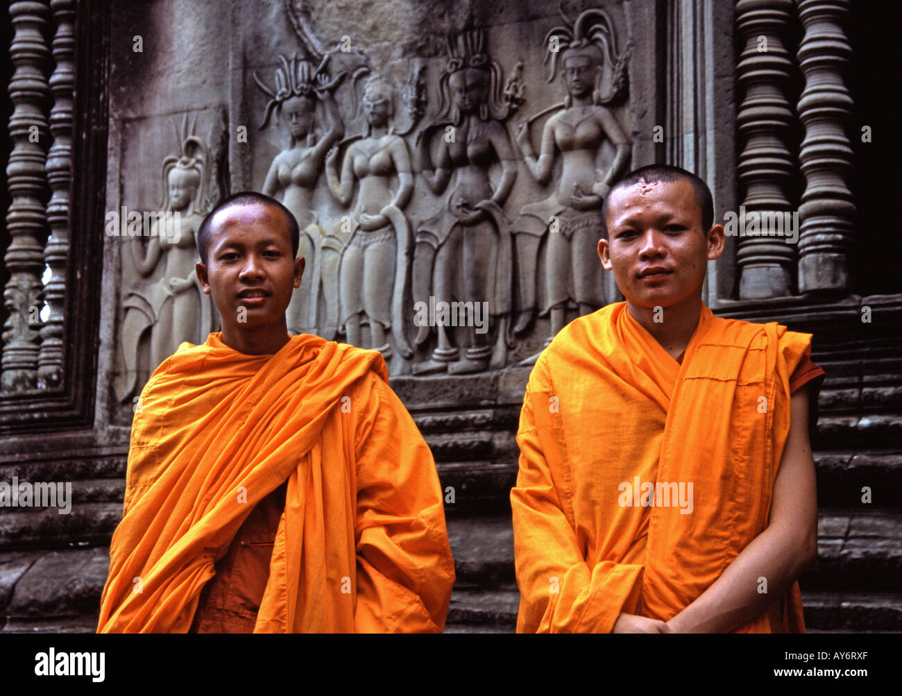 Two buddhist monks in angkor wat hi-res stock photography and images ...