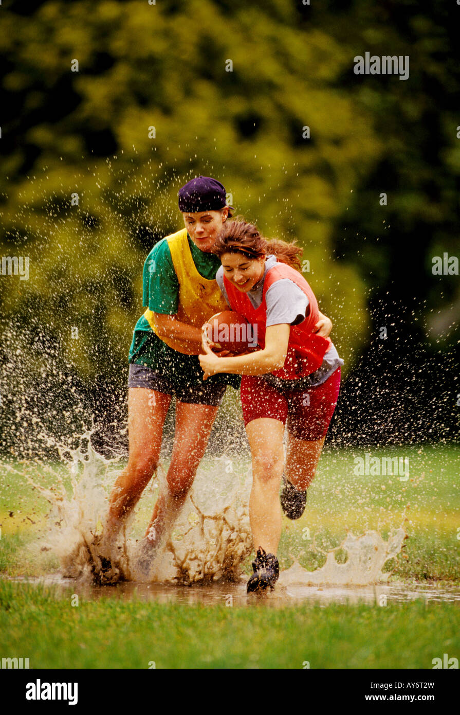 Football in mud hi-res stock photography and images - Alamy