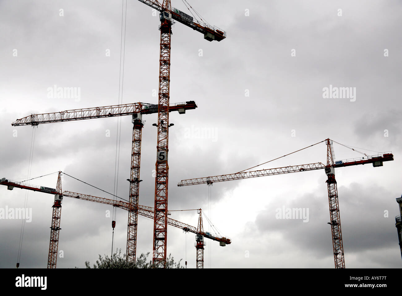 Cranes over construction site in Brussels Stock Photo - Alamy
