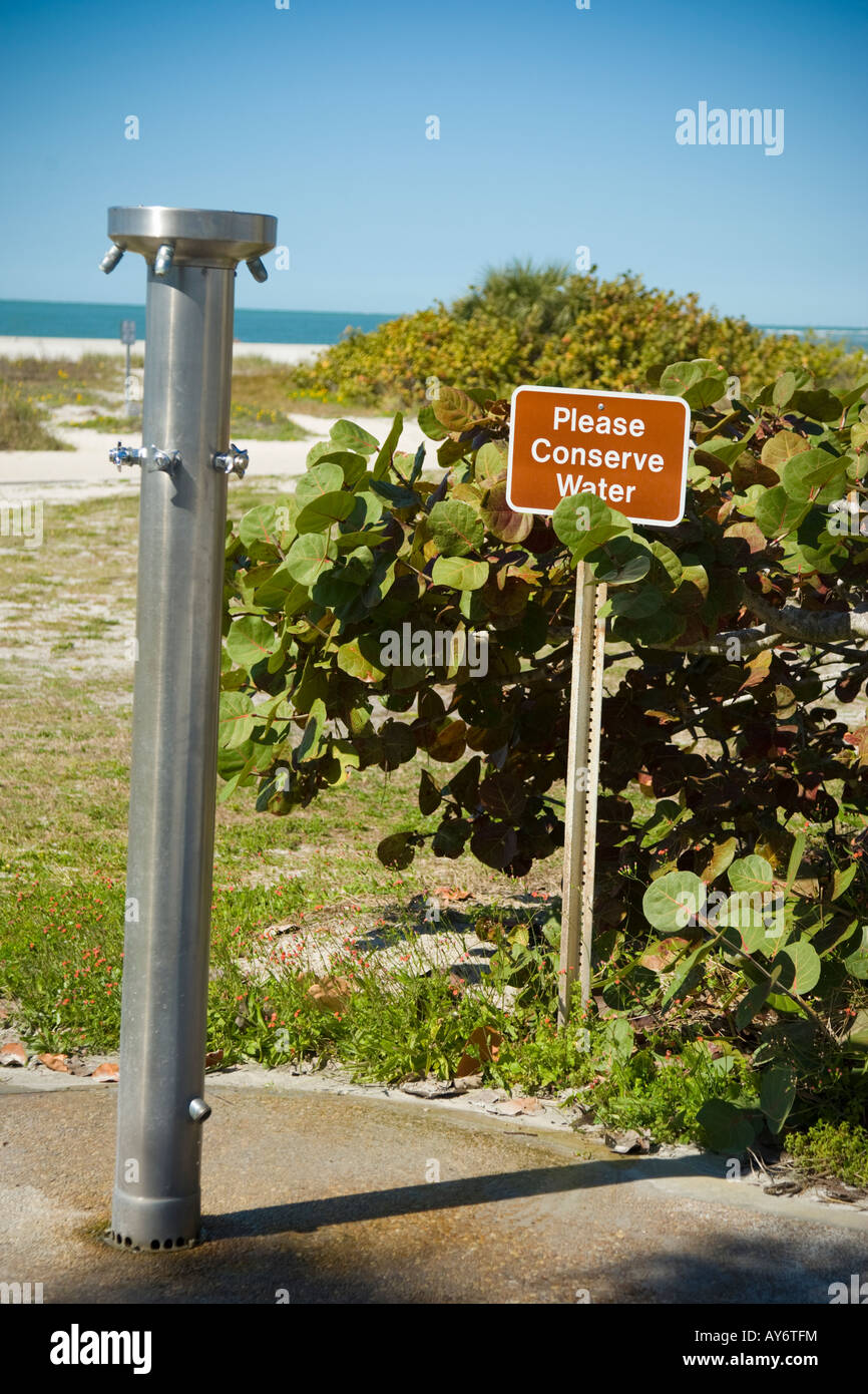 Sign near an outdoor shower Stock Photo - Alamy