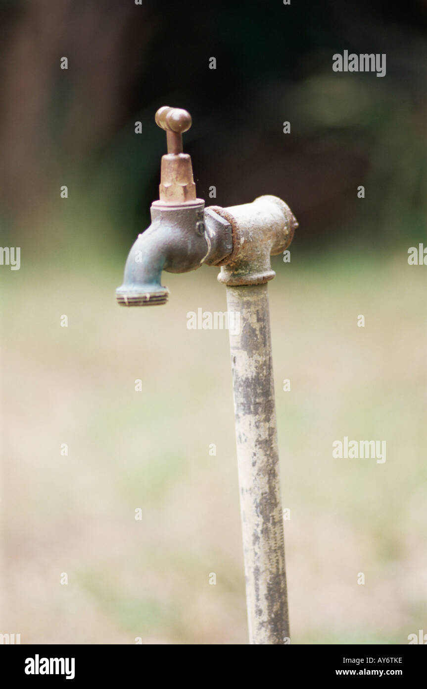 Water tap in field Stock Photo - Alamy