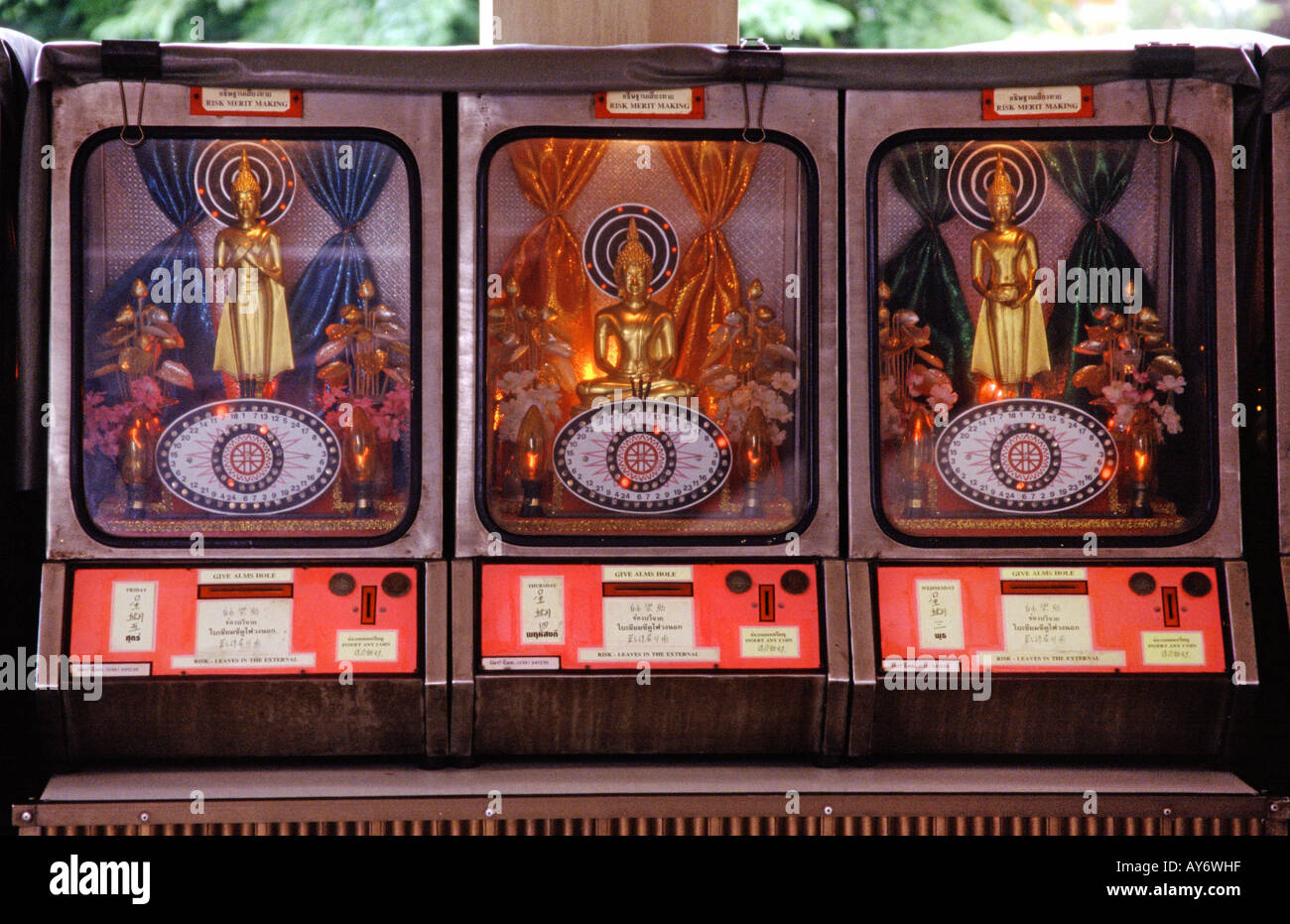 Buddha images inside fortune telling machines in Bangkok Thailand Stock ...